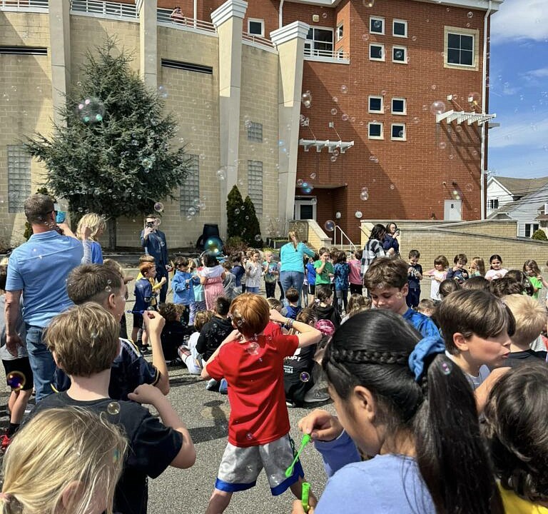 Margate elementary school students Blow Bubbles for Autism - DownBeach