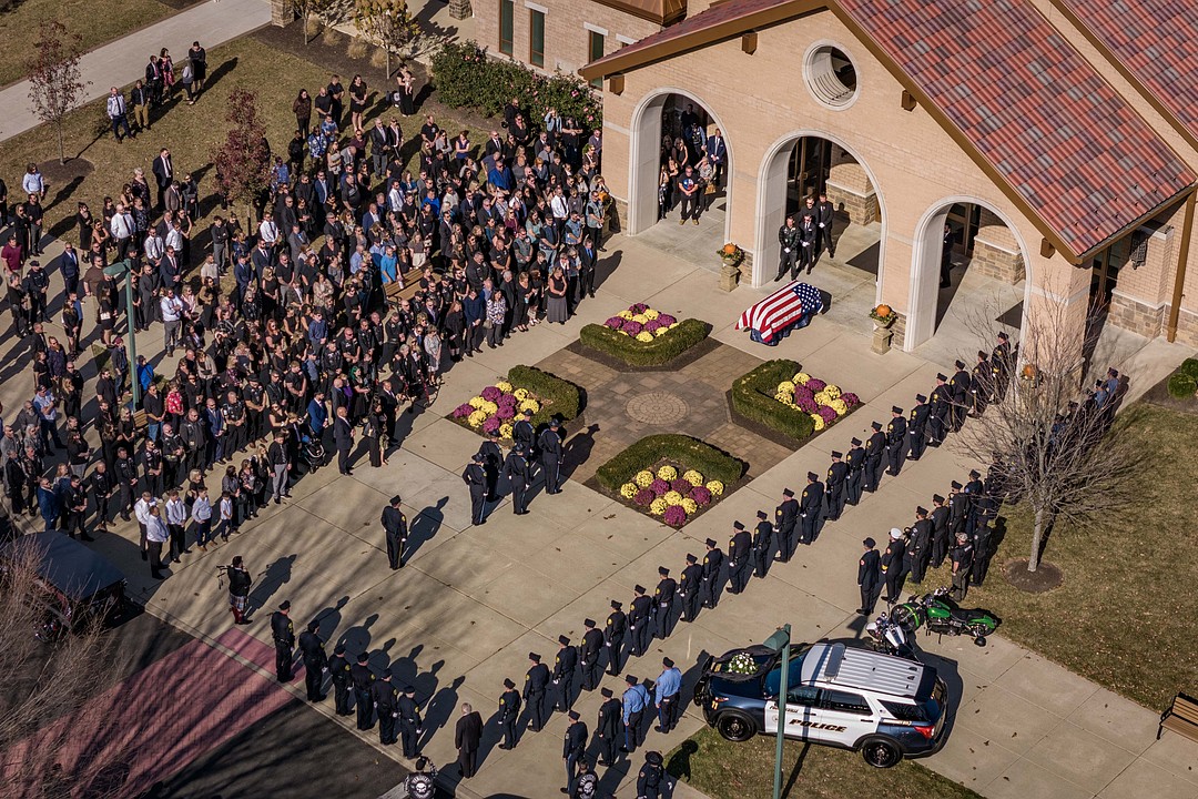 WATCH: Law enforcement, family, friends mourn police officer at ...